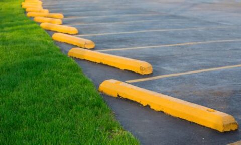 What Are Wheel Stops and How Do They Enhance Parking Safety?